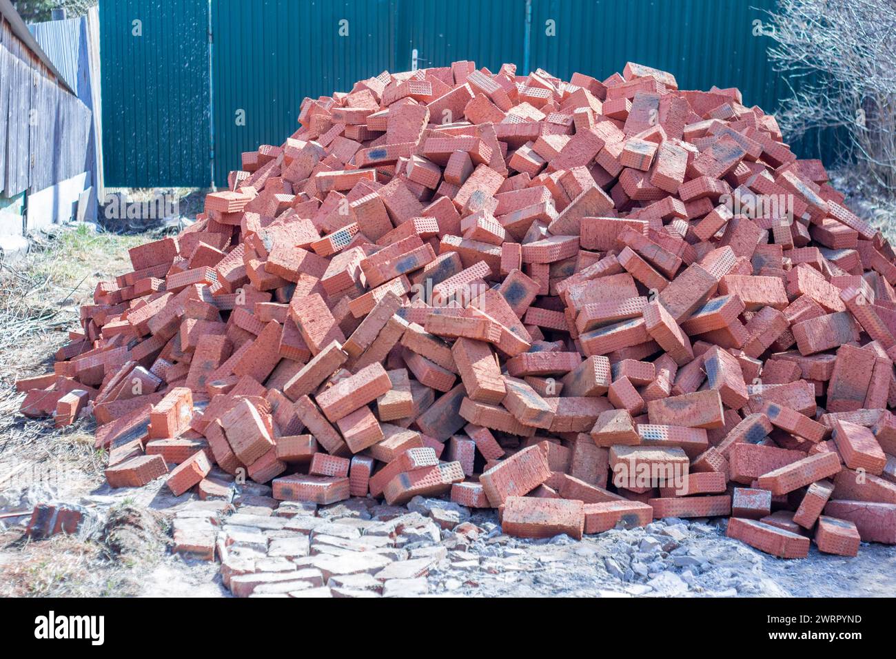 Pile of construction new red bricks for construction Stock Photo - Alamy