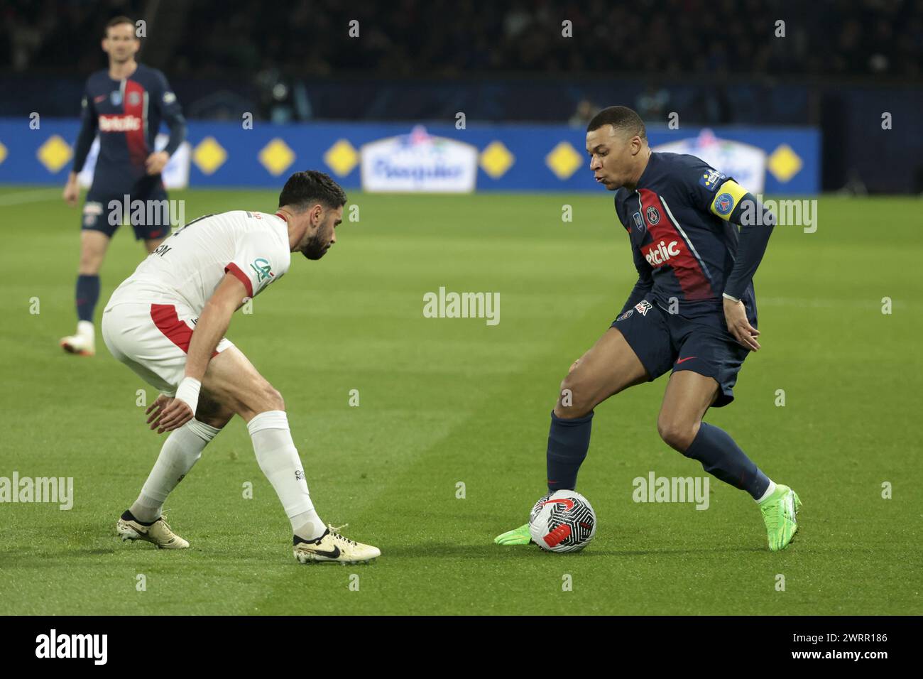 Kylian Mbappe of PSG, left Morgan Sanson of Nice during the French Cup ...