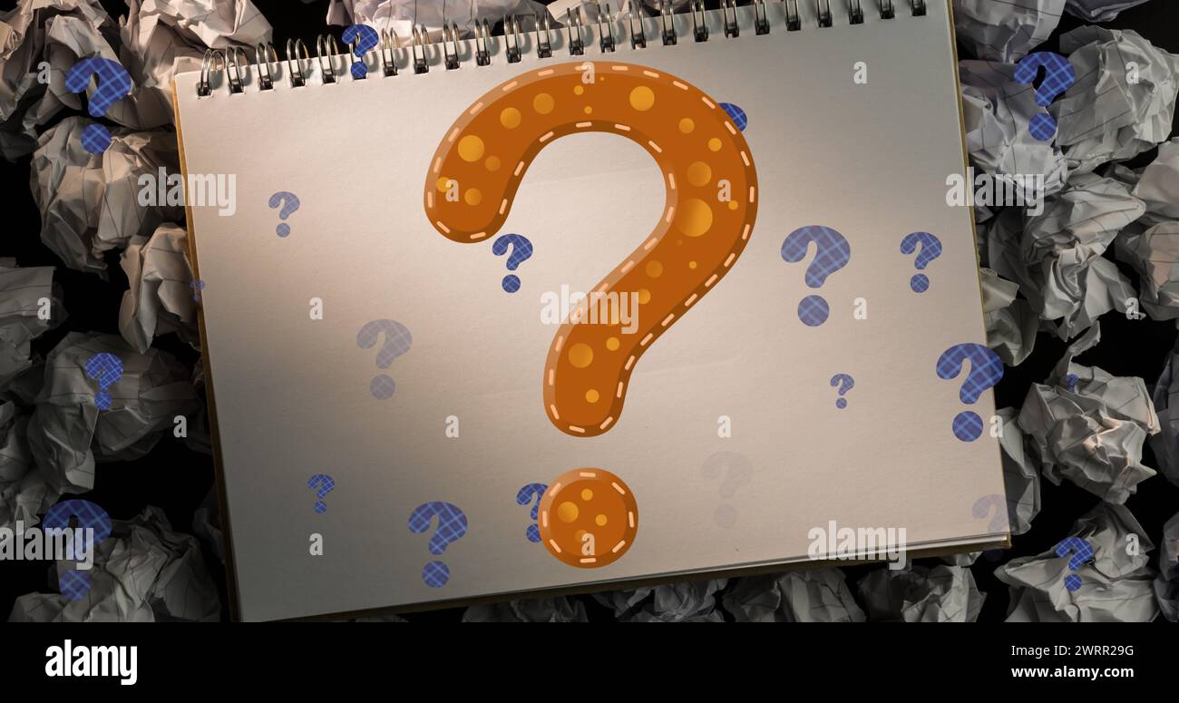 Image of question marks over notebook and paper Stock Photo - Alamy