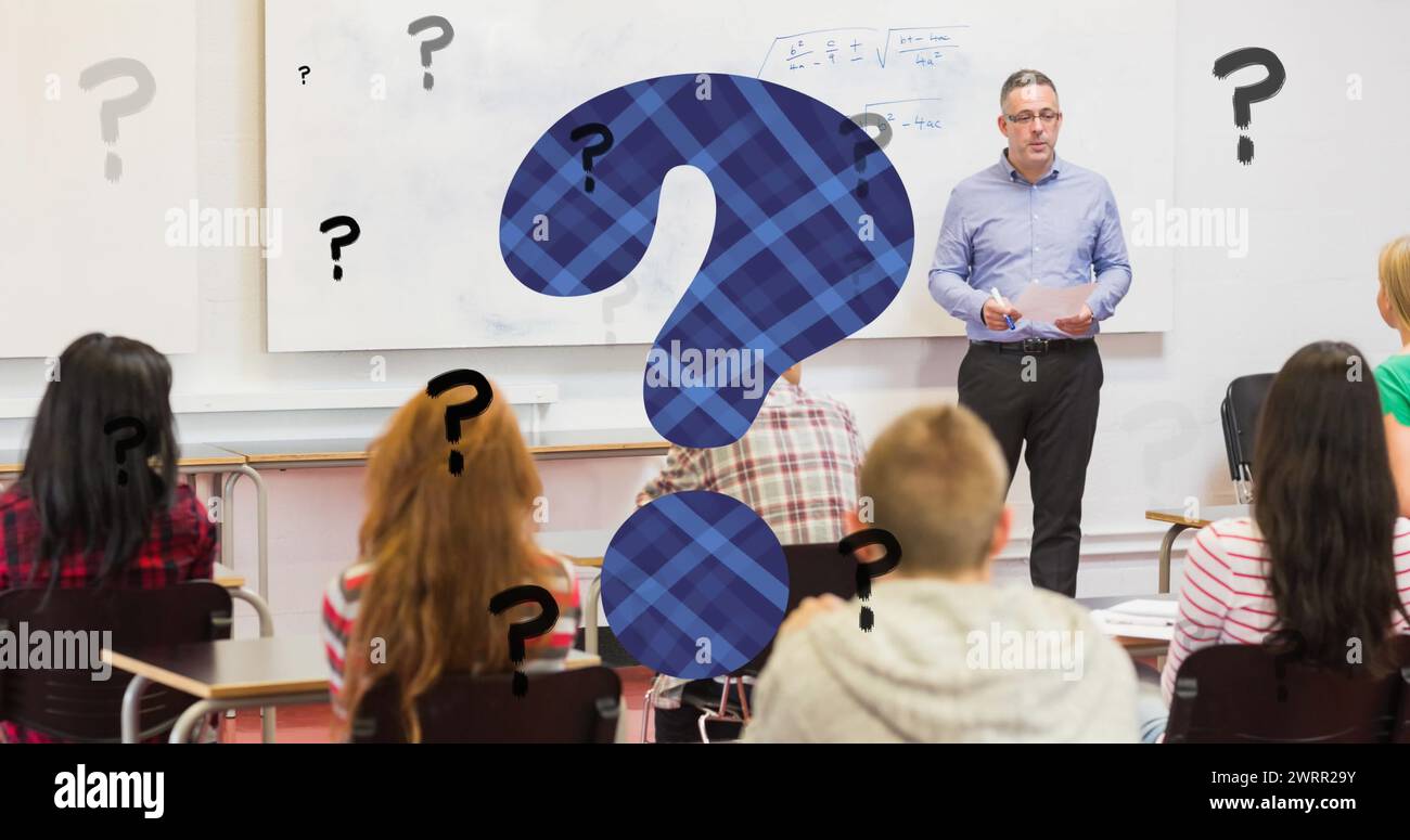 Image of question marks over diverse students in classroom Stock Photo ...