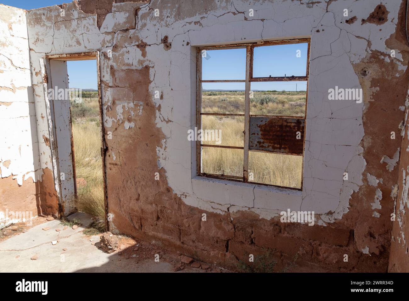 The view through a window of an abandoned farmhouse on a rural farm in ...