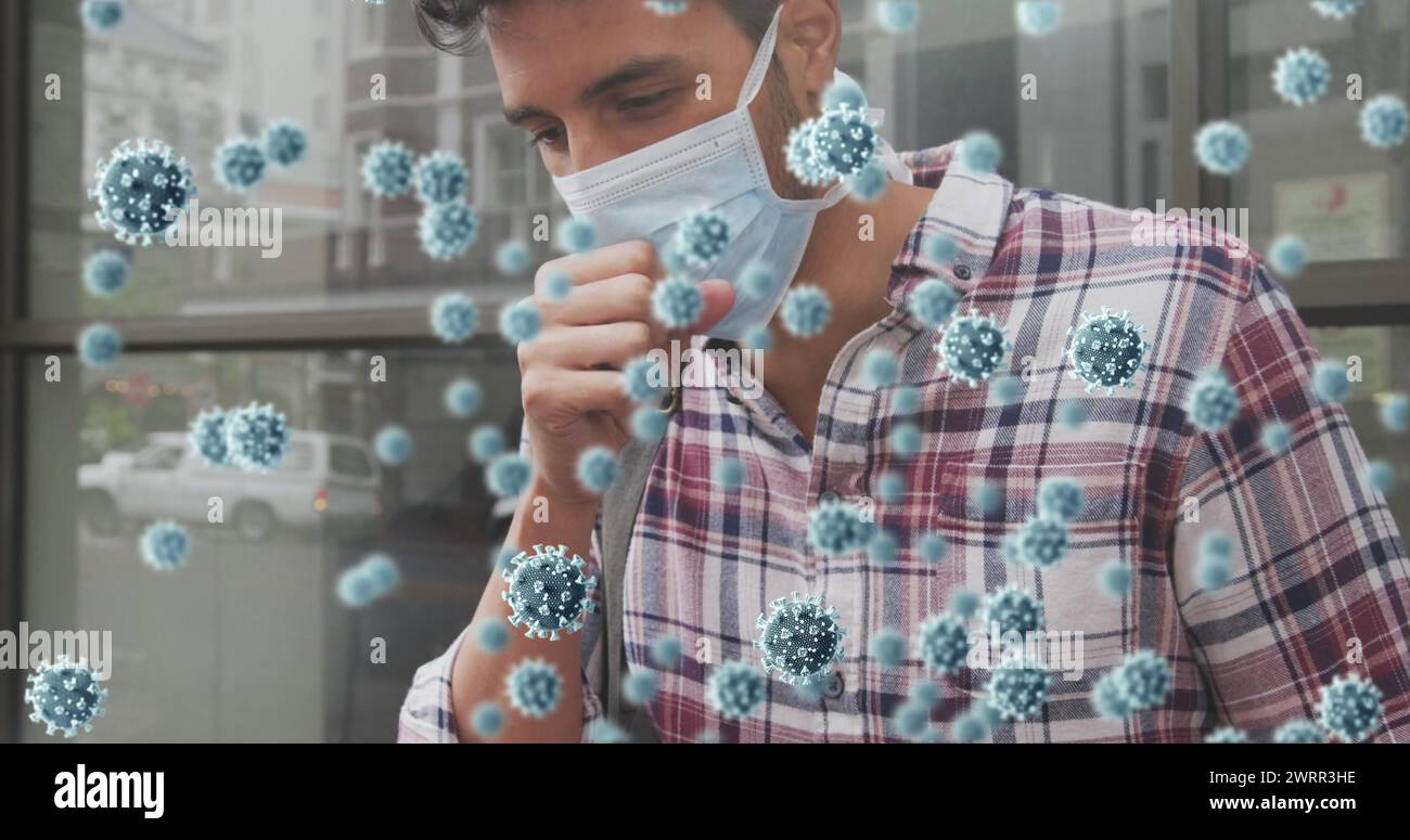 Image of virus cells and biohazard sign over caucasian man wearing face ...