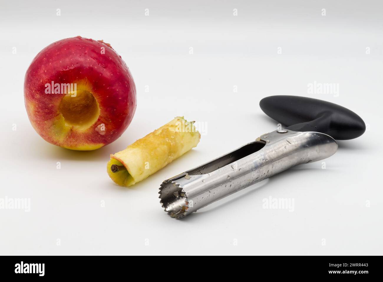 Apple corer. Tool for removing the apple core on white background Stock ...