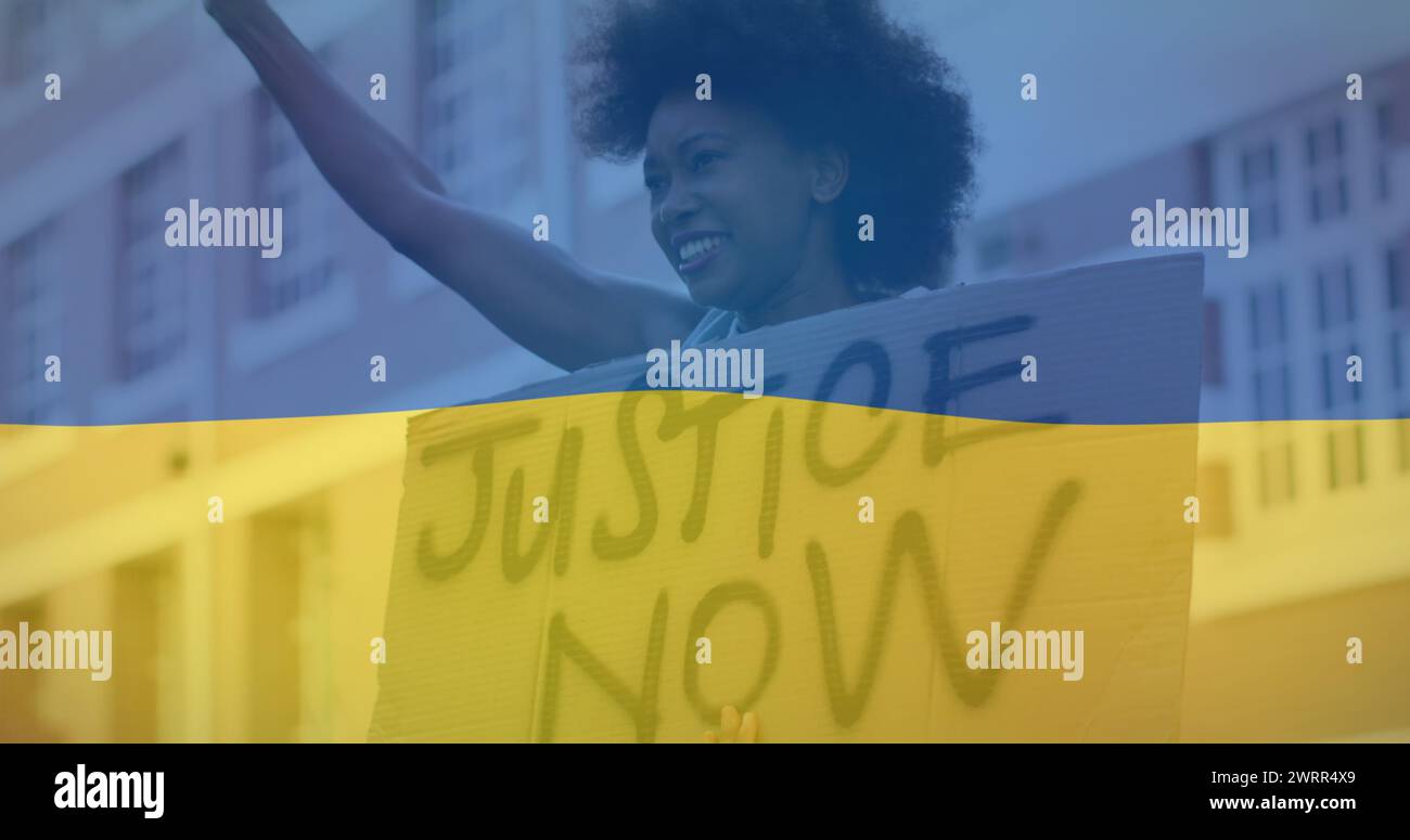 Image of flag of ukraine over african american female protester Stock ...