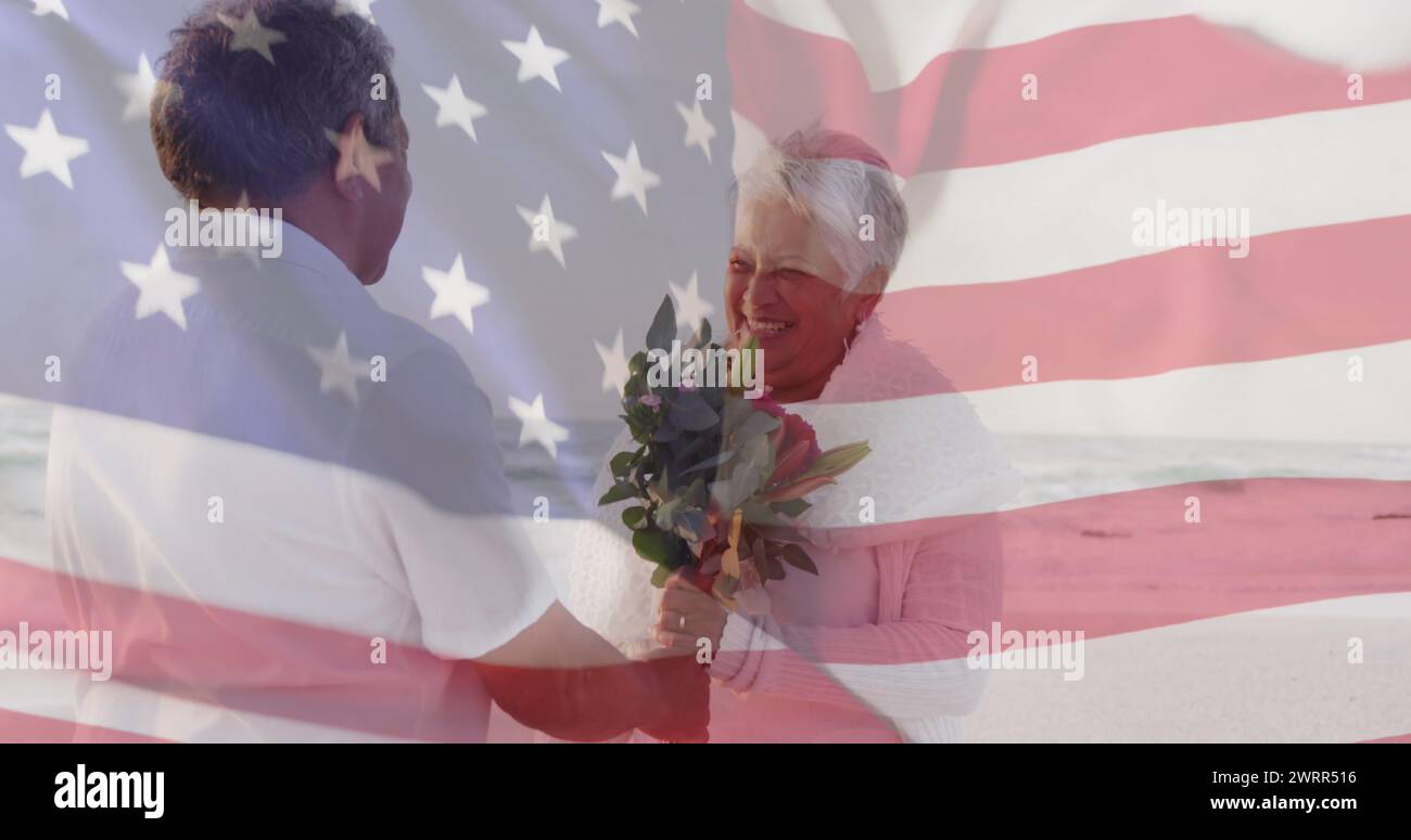 Image of flag of united states of america over senior biracial couple ...