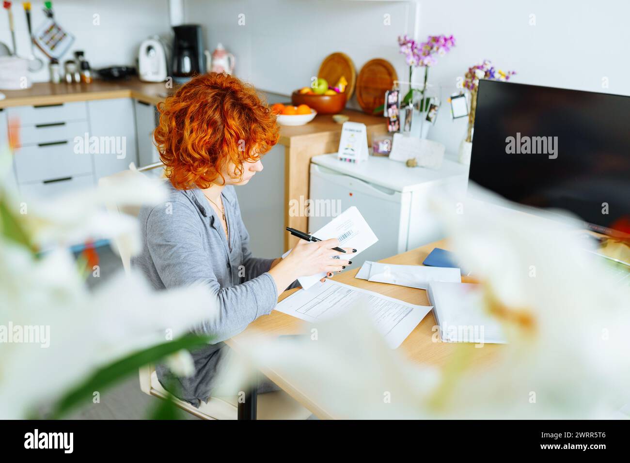 portrait attractive teenage girl filling out paper form Stock Photo - Alamy