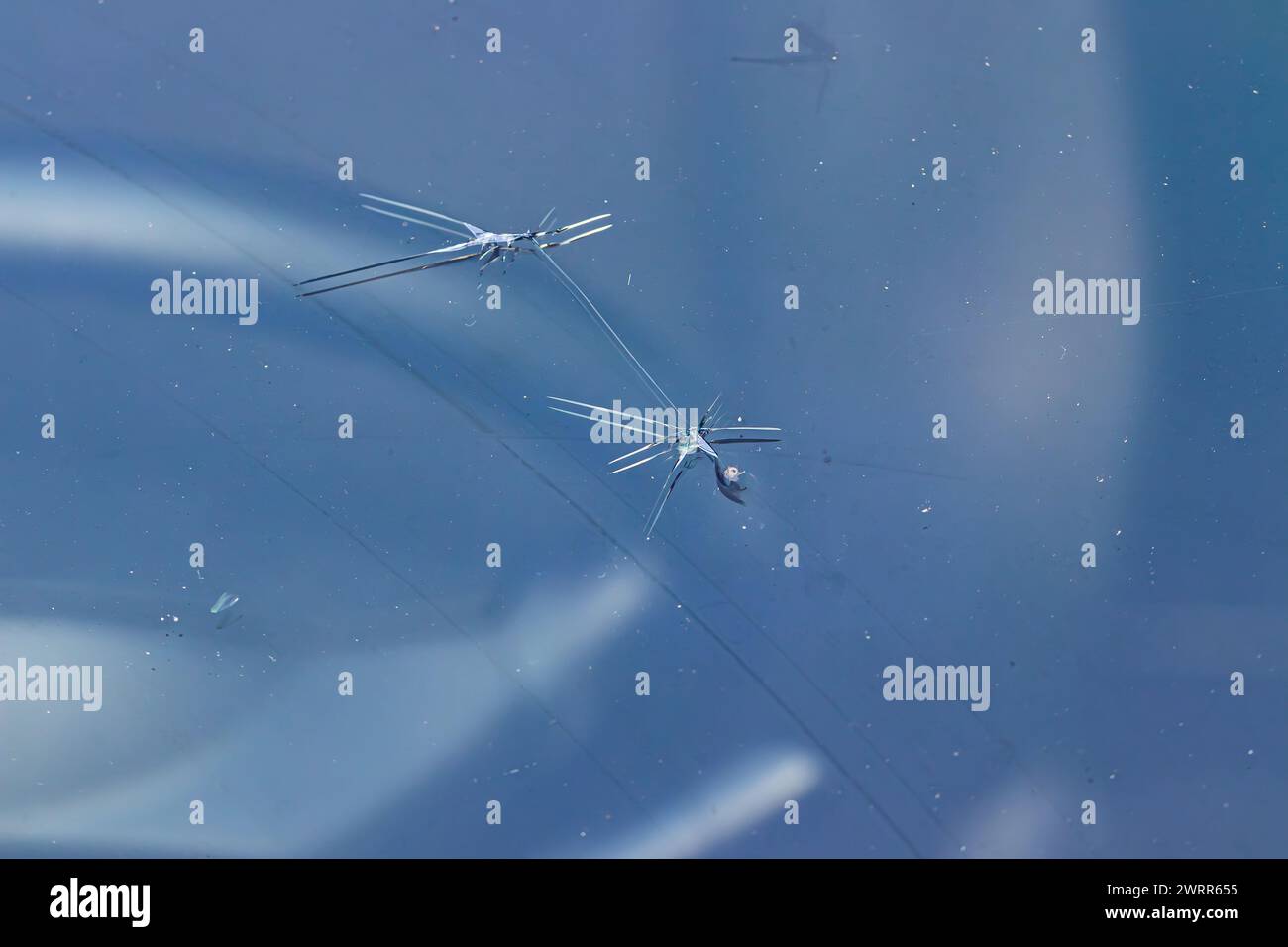 Crack windshield from stone, broken car glass Stock Photo - Alamy