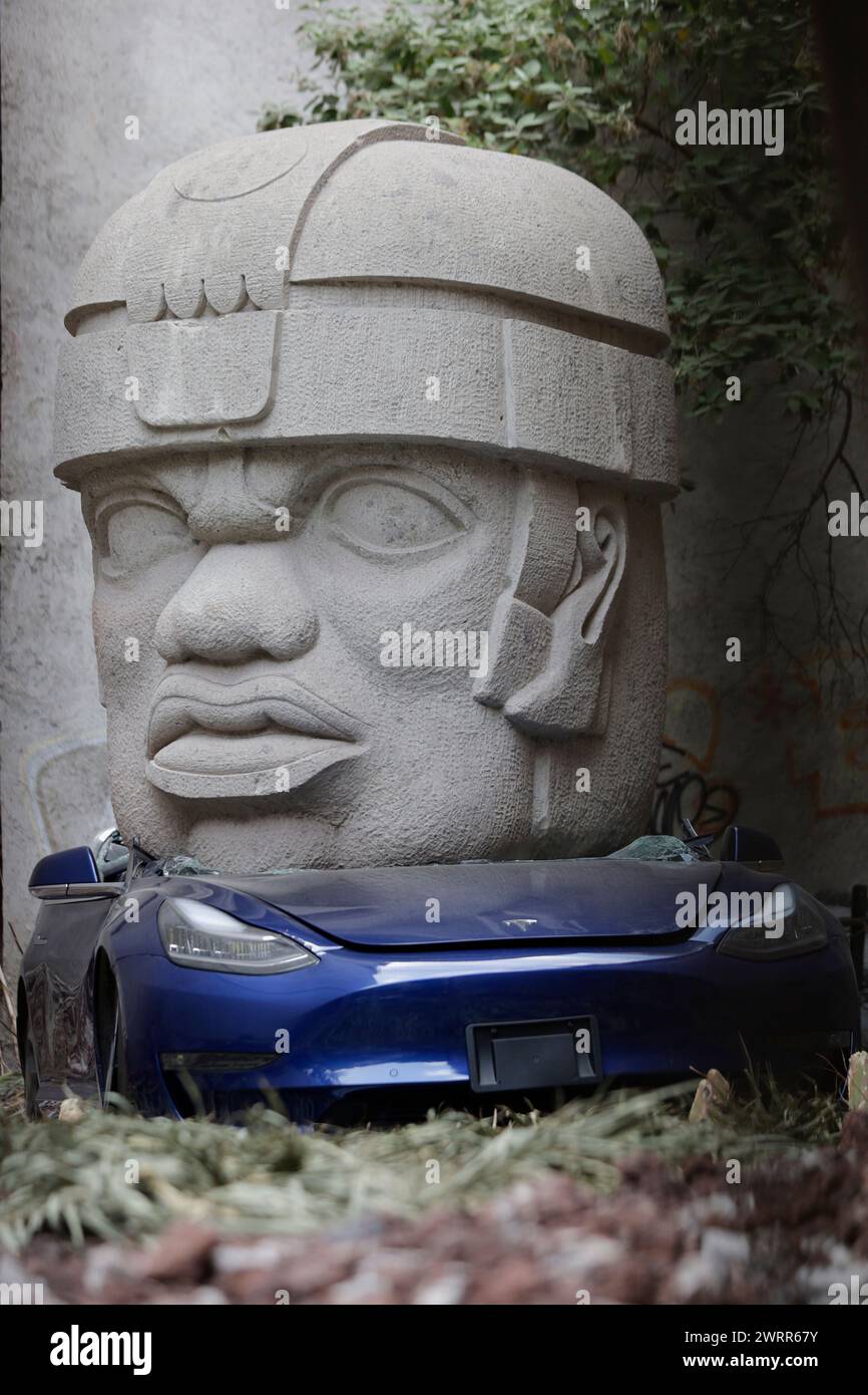 Colossal olmec head replica crushing a tesla in mexico city hi-res ...