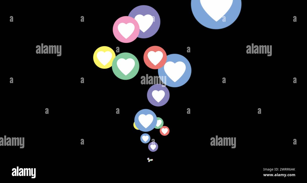 Digital image of heart icons in colorful circles moving upwards against ...