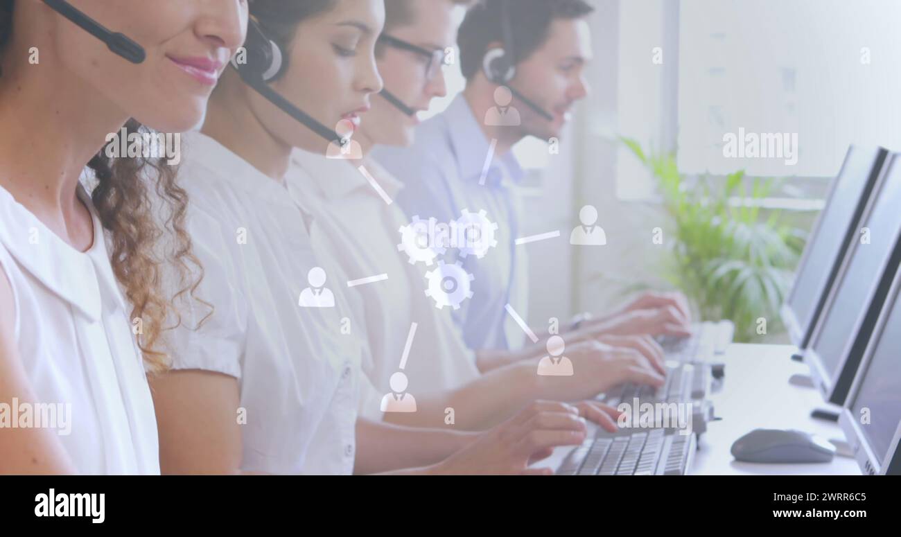 Diverse call center team works as icons rotate in foreground, 4k Stock ...