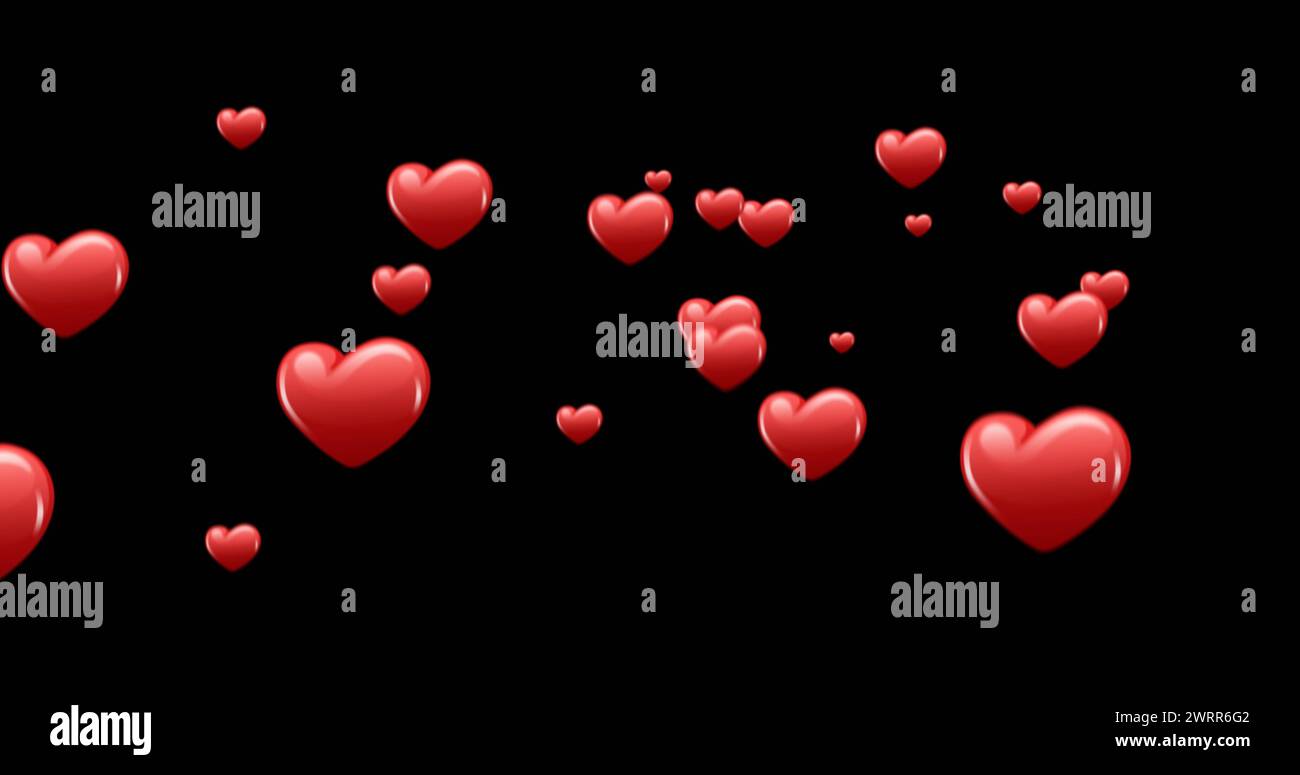 Digital image of red heart icons moving upwards in the black background ...
