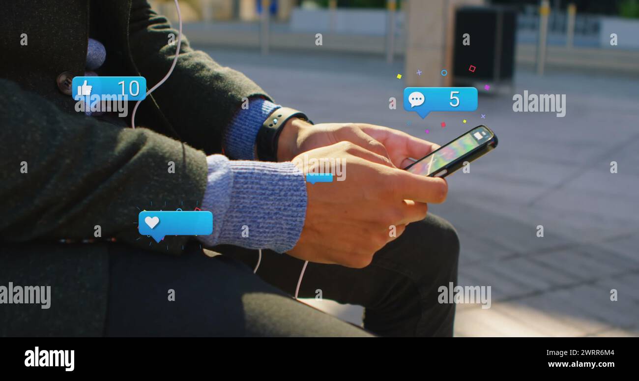 Image of social media icons falling over person using smartphone Stock ...
