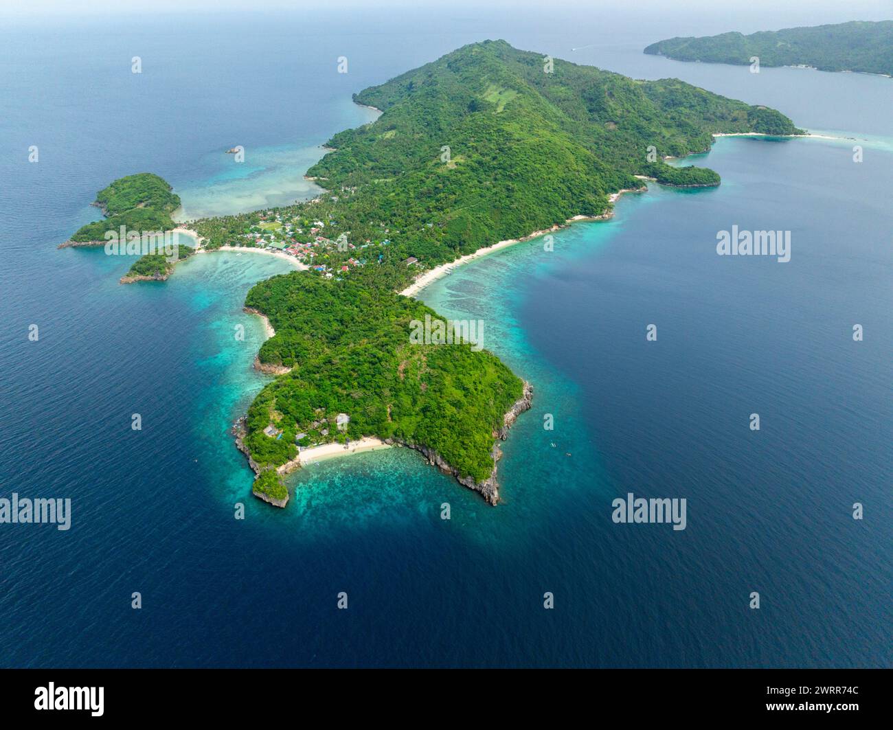 Drone view of tropical beach with white sand and corals. Alad Island ...