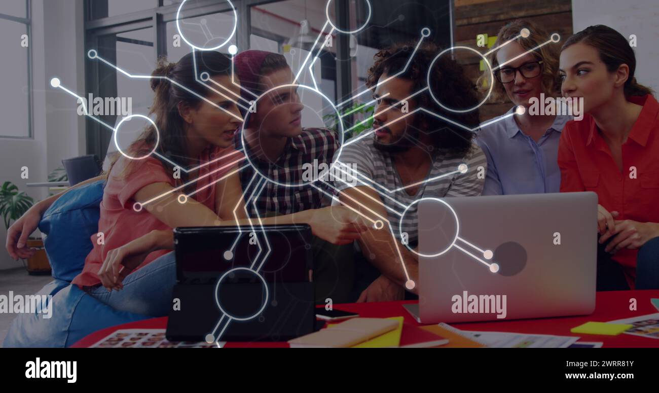 Image of network of connections over diverse female and male coworkers ...