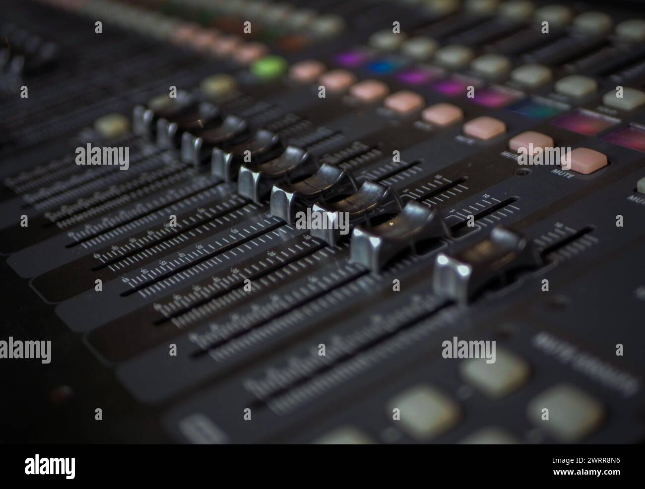 Professional audio mixing console with faders and adjusting knobs Stock Photo - Alamy