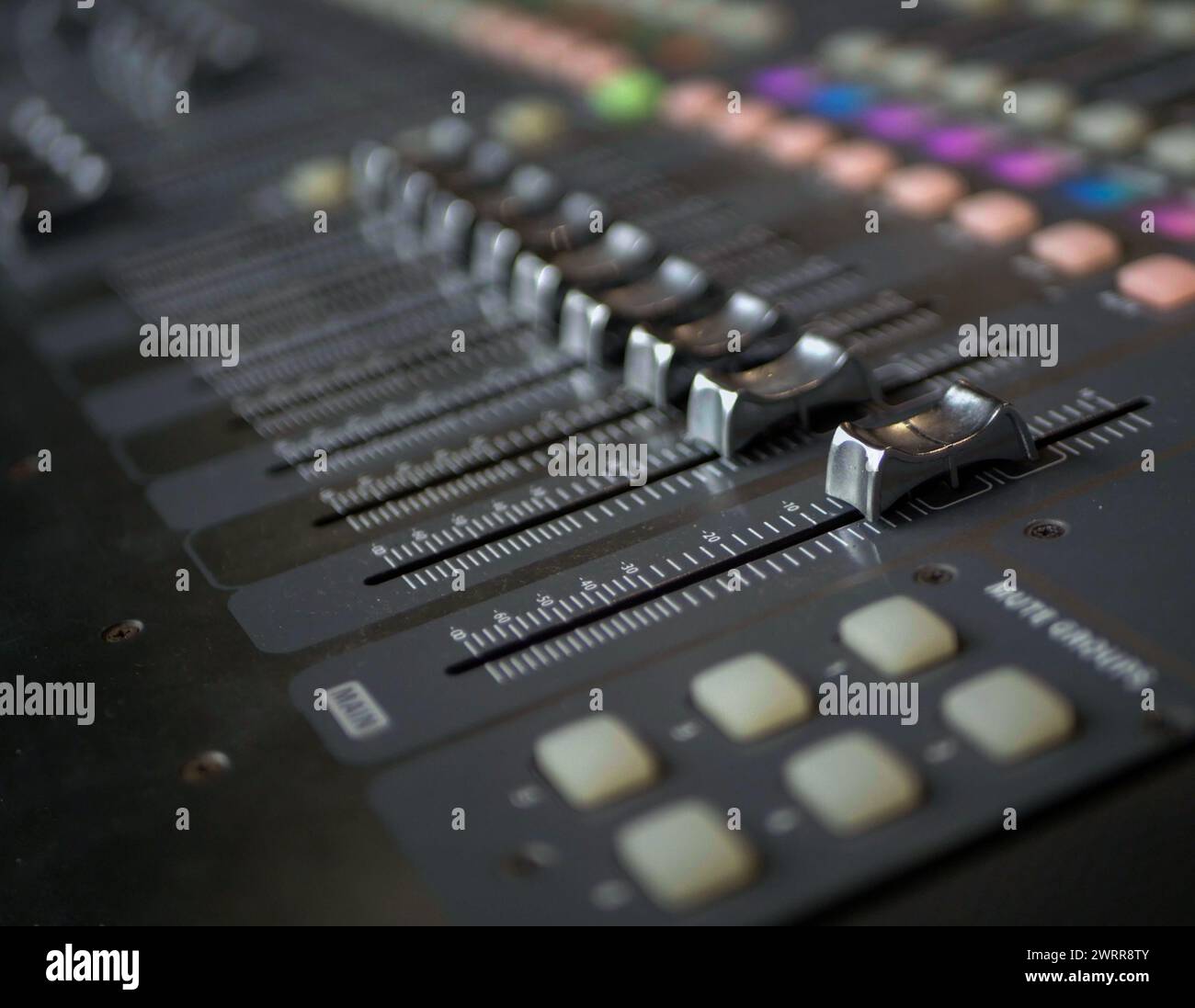 Professional audio mixing console with faders and adjusting knobs Stock Photo - Alamy