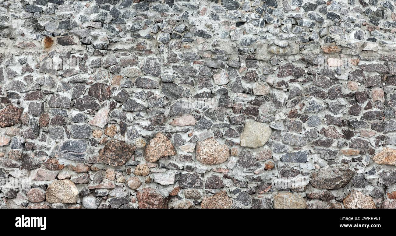 Gray stone wall of an ancient fortress, background photo texture, front ...