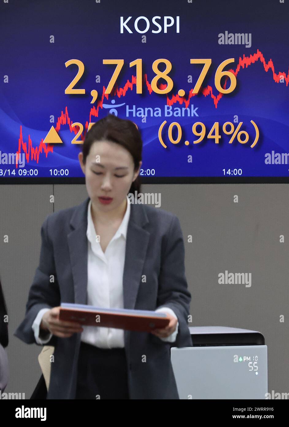 14th Mar, 2024. KOSPI tops 2,700 in almost 2 yrs An electronic signboard in the dealing room of ...