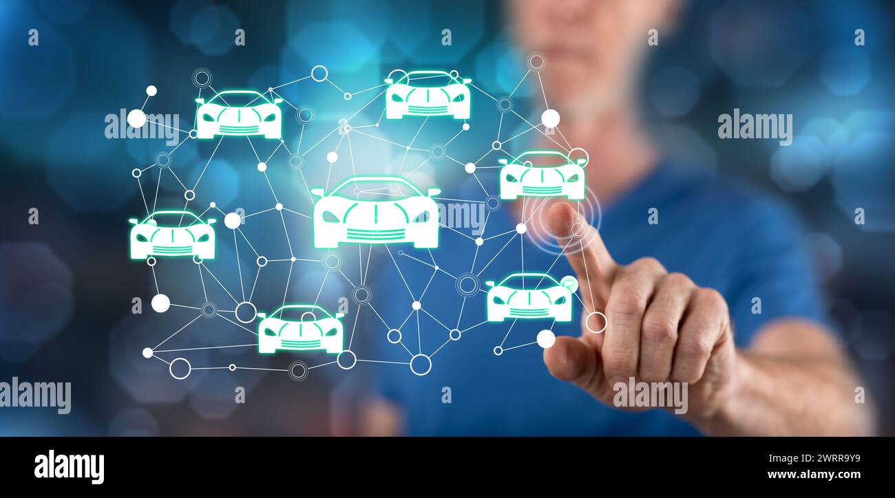 Man touching a smart car concept on a touch screen with his finger ...
