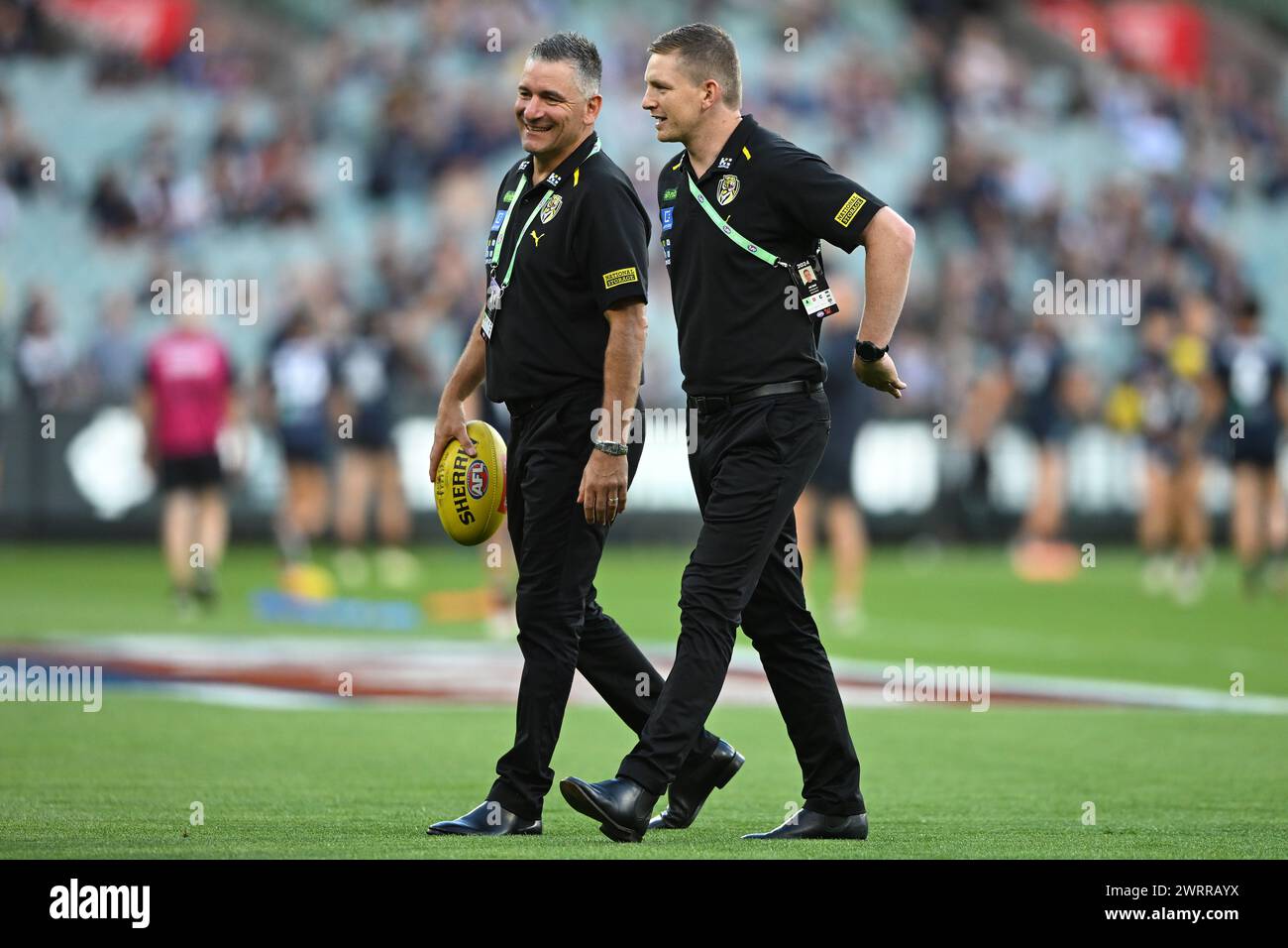 Melbourne, Australia. 14th Mar, 2024. Richmond coach Adam Yze (left ...