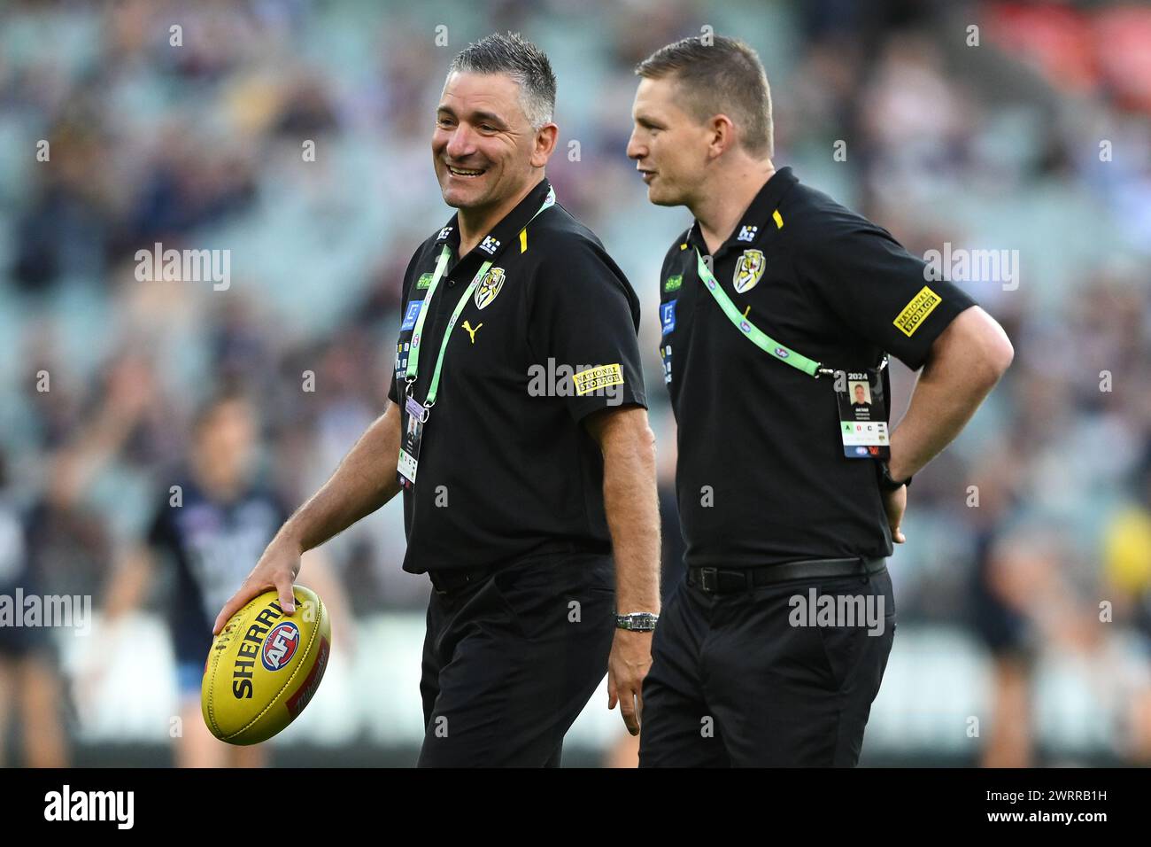 Melbourne, Australia. 14th Mar, 2024. Richmond coach Adam Yze (left ...
