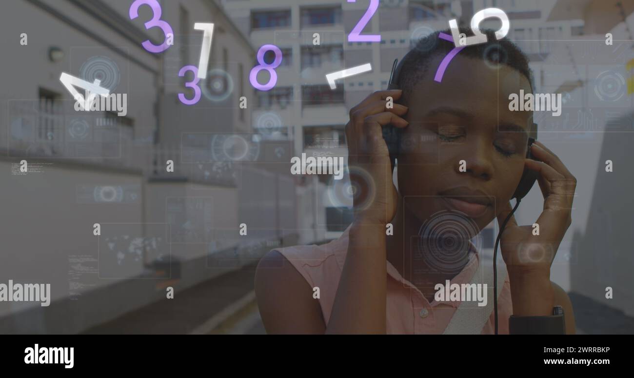 Image of digital data processing over african american woman using ...