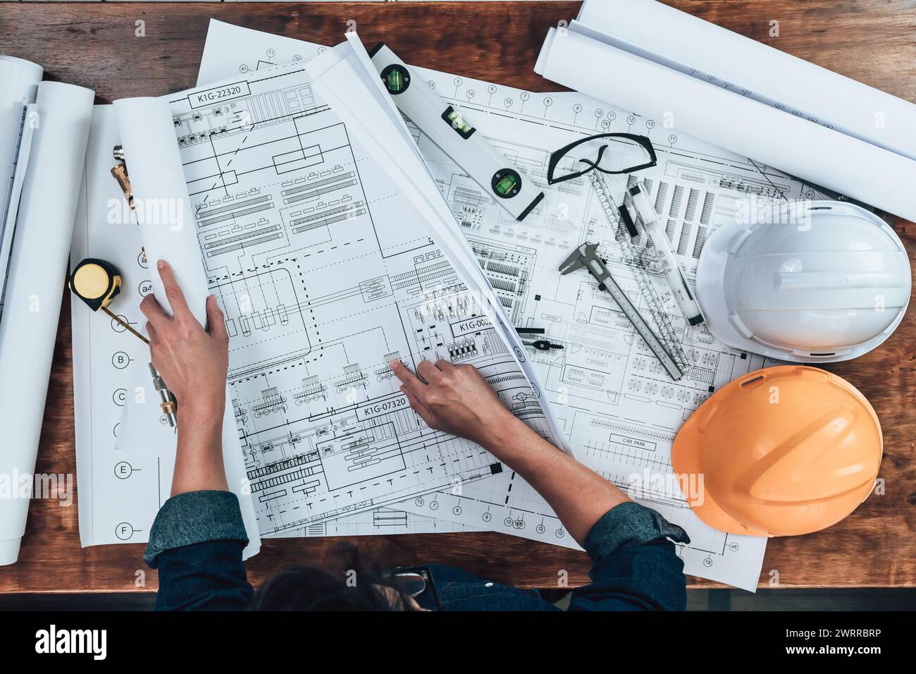 Top view Engineering working with drawings inspection on the office ...