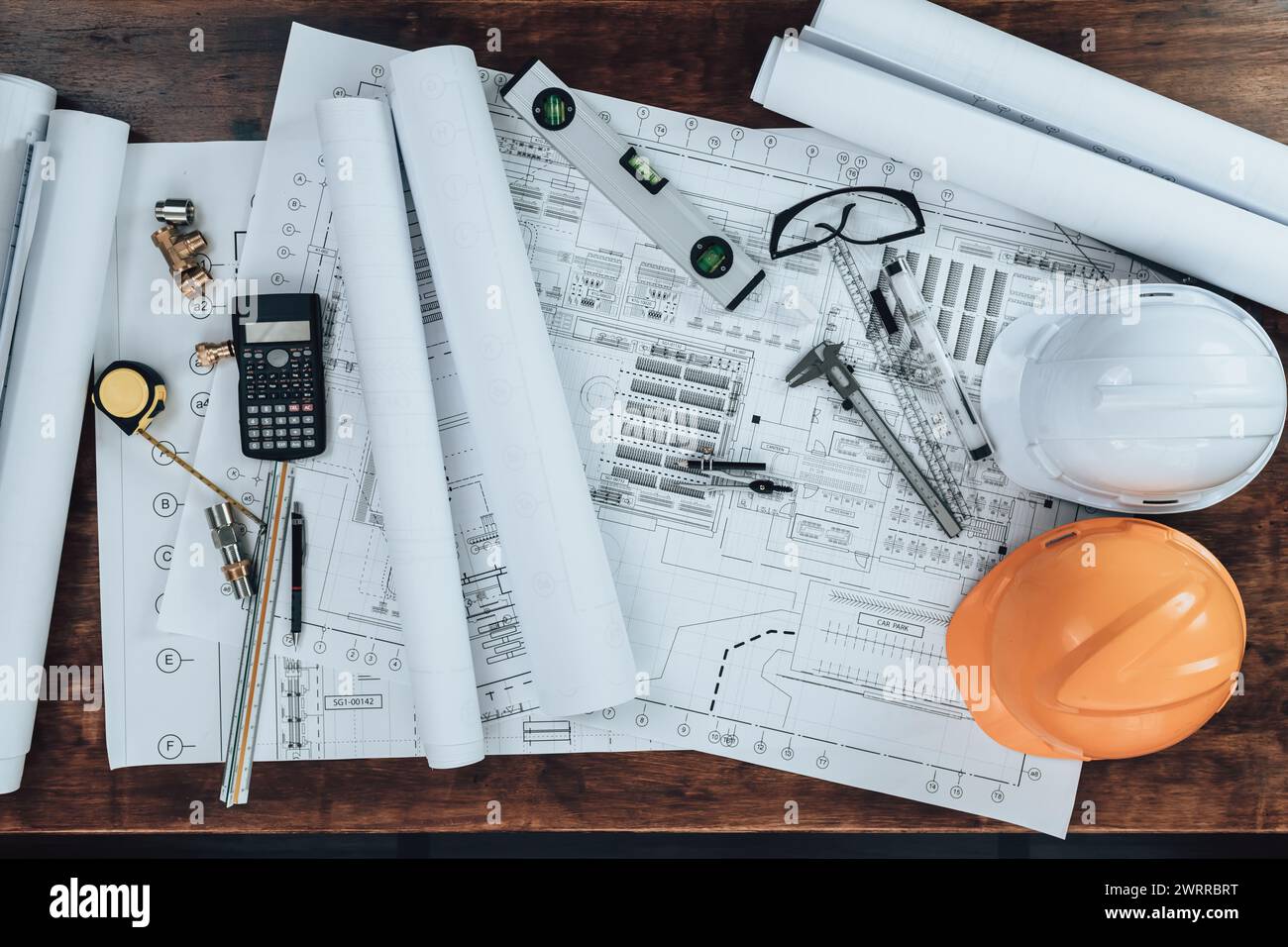 Top view engineer tool and Calculator, triangle ruler, safety glasses ...