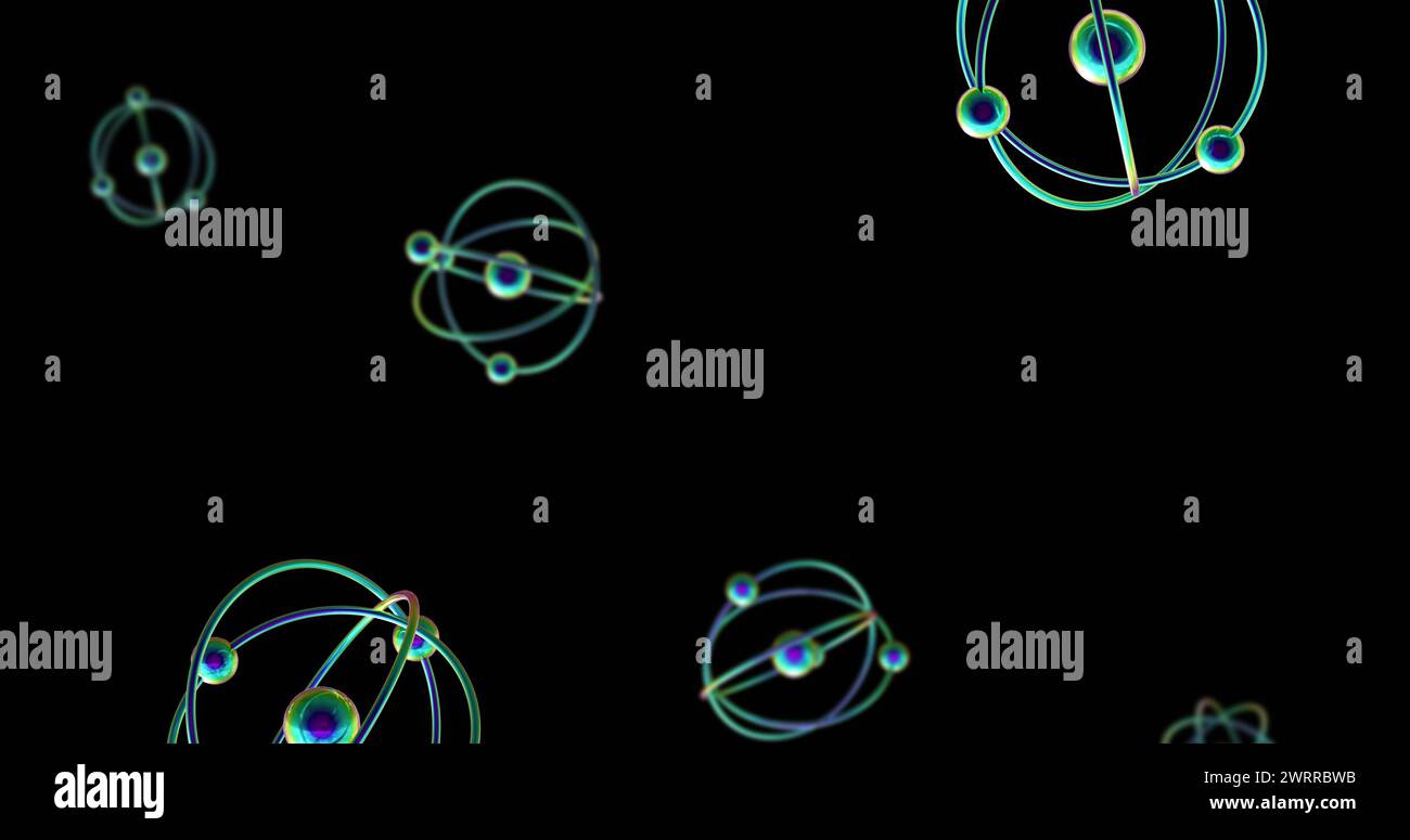 Image of atom models spinning on black background Stock Photo - Alamy