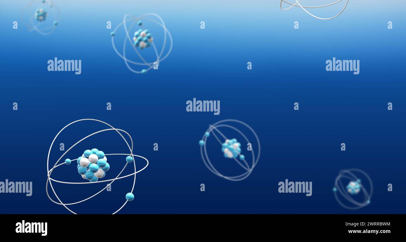 Image of atom models spinning on blue background Stock Photo - Alamy