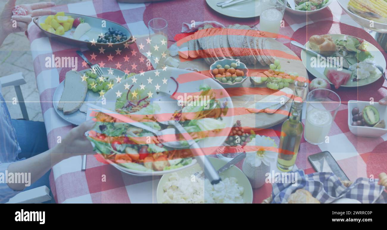 Image of flag of usa waving over table full of food Stock Photo - Alamy