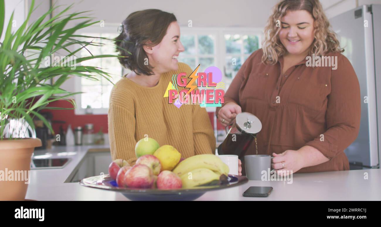 Image of girl power text over two woman making coffee Stock Photo - Alamy