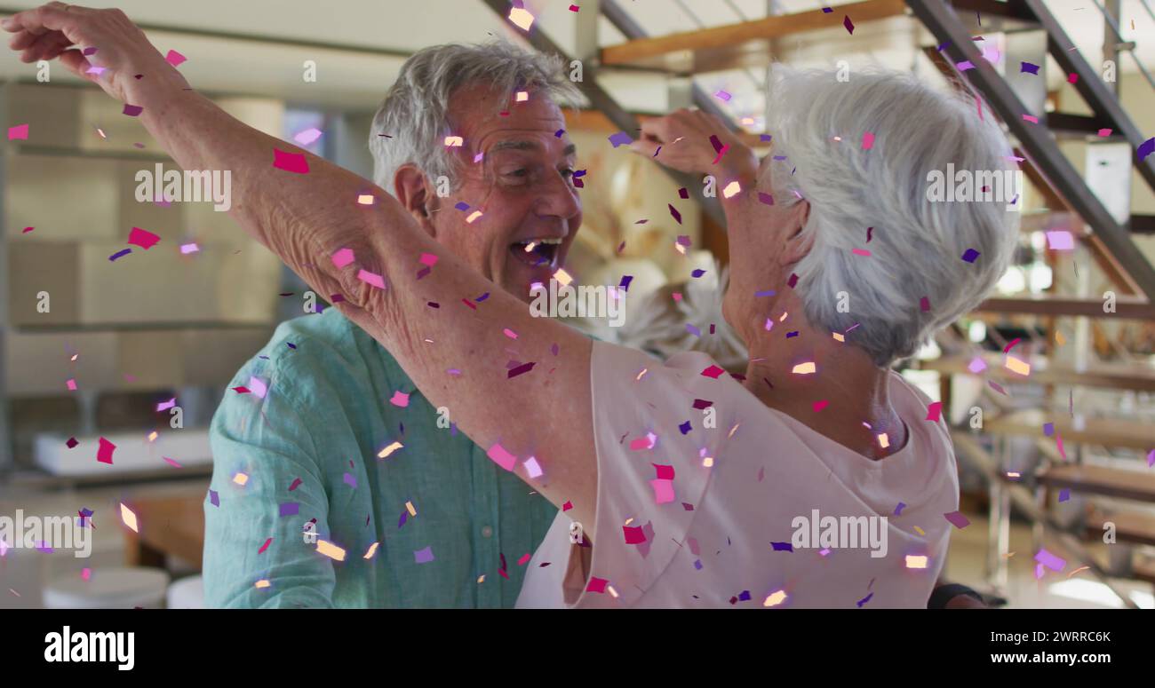 Happy couple falling confetti hi-res stock photography and images - Alamy