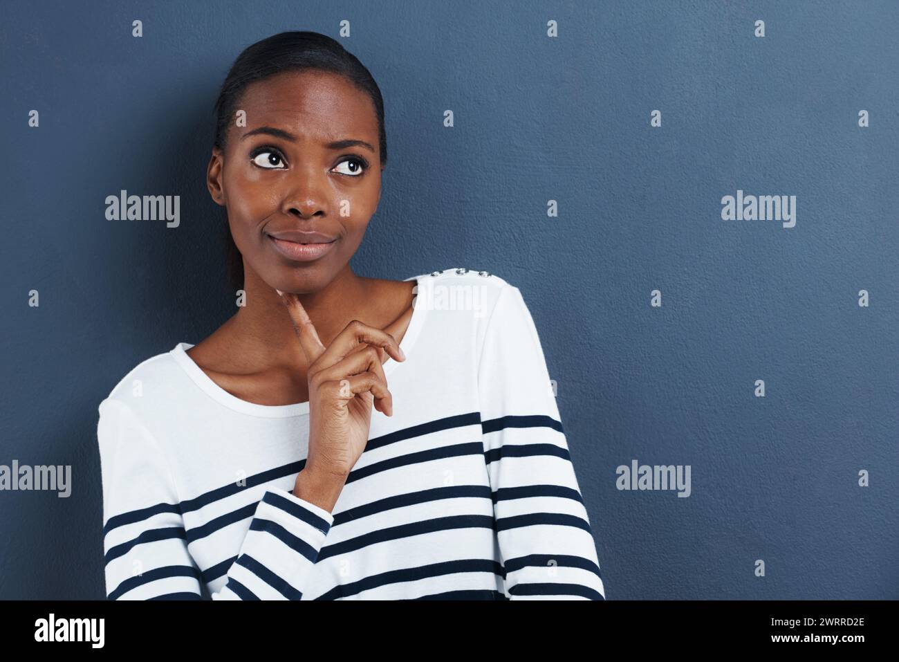 Why thinking black woman hi-res stock photography and images - Alamy
