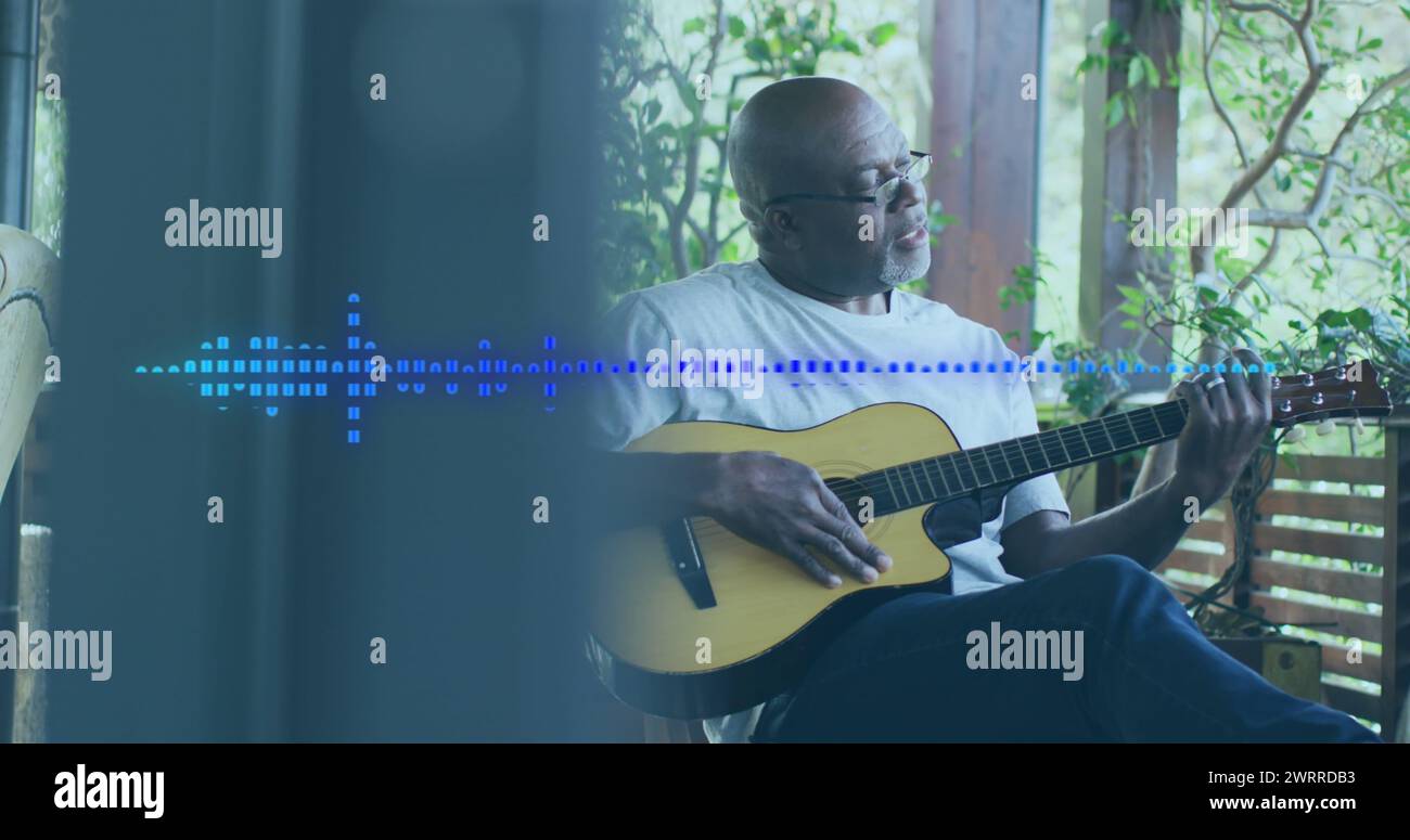 Image of blue dot eq meter over senior african american man playing ...