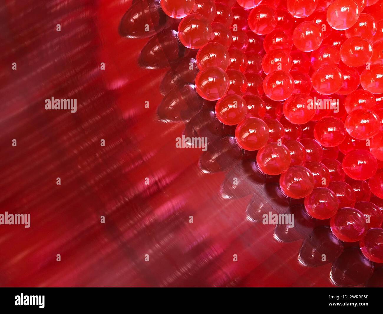 Transparent red hydrogel balls hi-res stock photography and images - Alamy