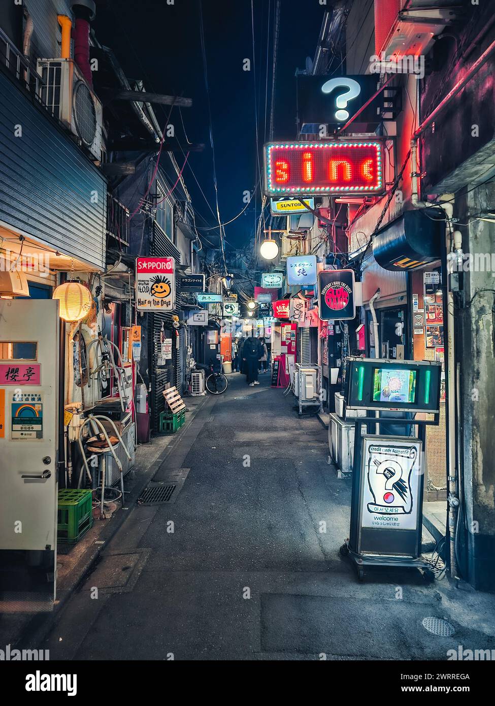Nightlife and Neon Lights In The Streets Of Tokyo Stock Photo - Alamy