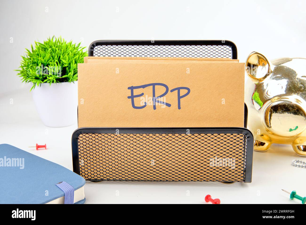 Abbreviation ERP - Enterprise Resource Planning on the mustard-colored ...