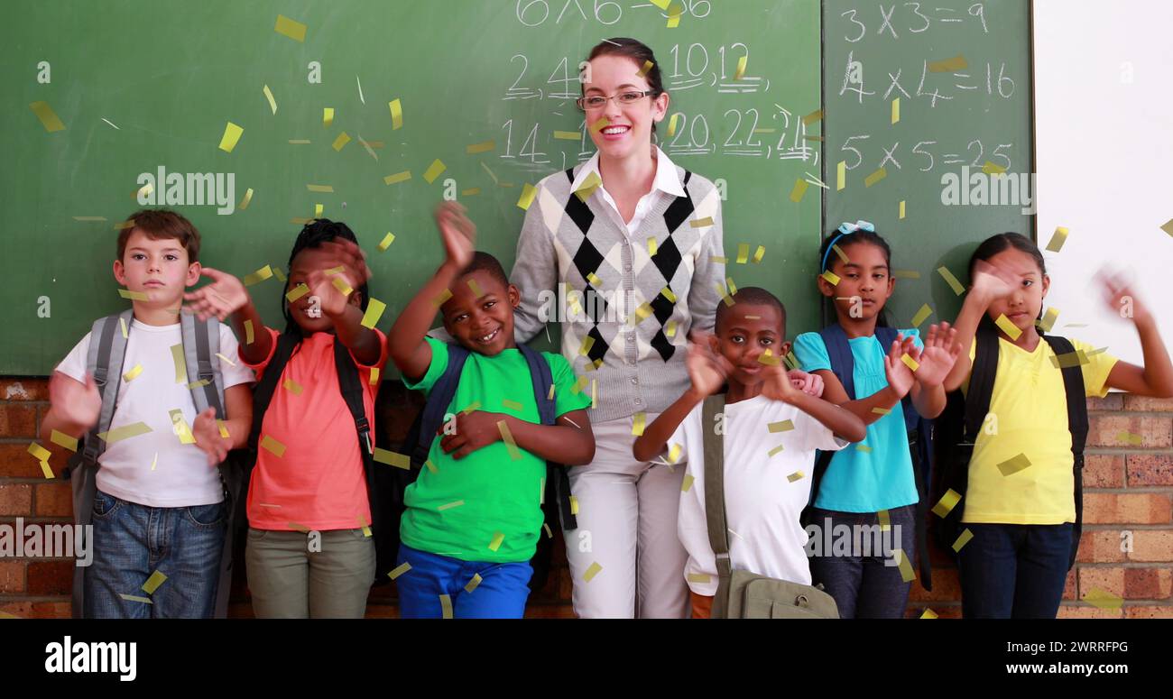 Golden confetti falling against group of students and caucasian female ...