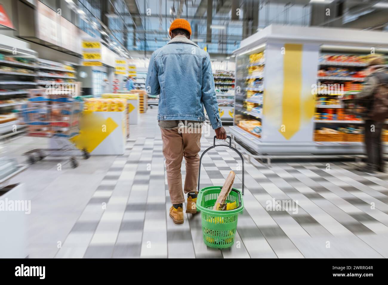 Man from behind walking hi-res stock photography and images - Alamy