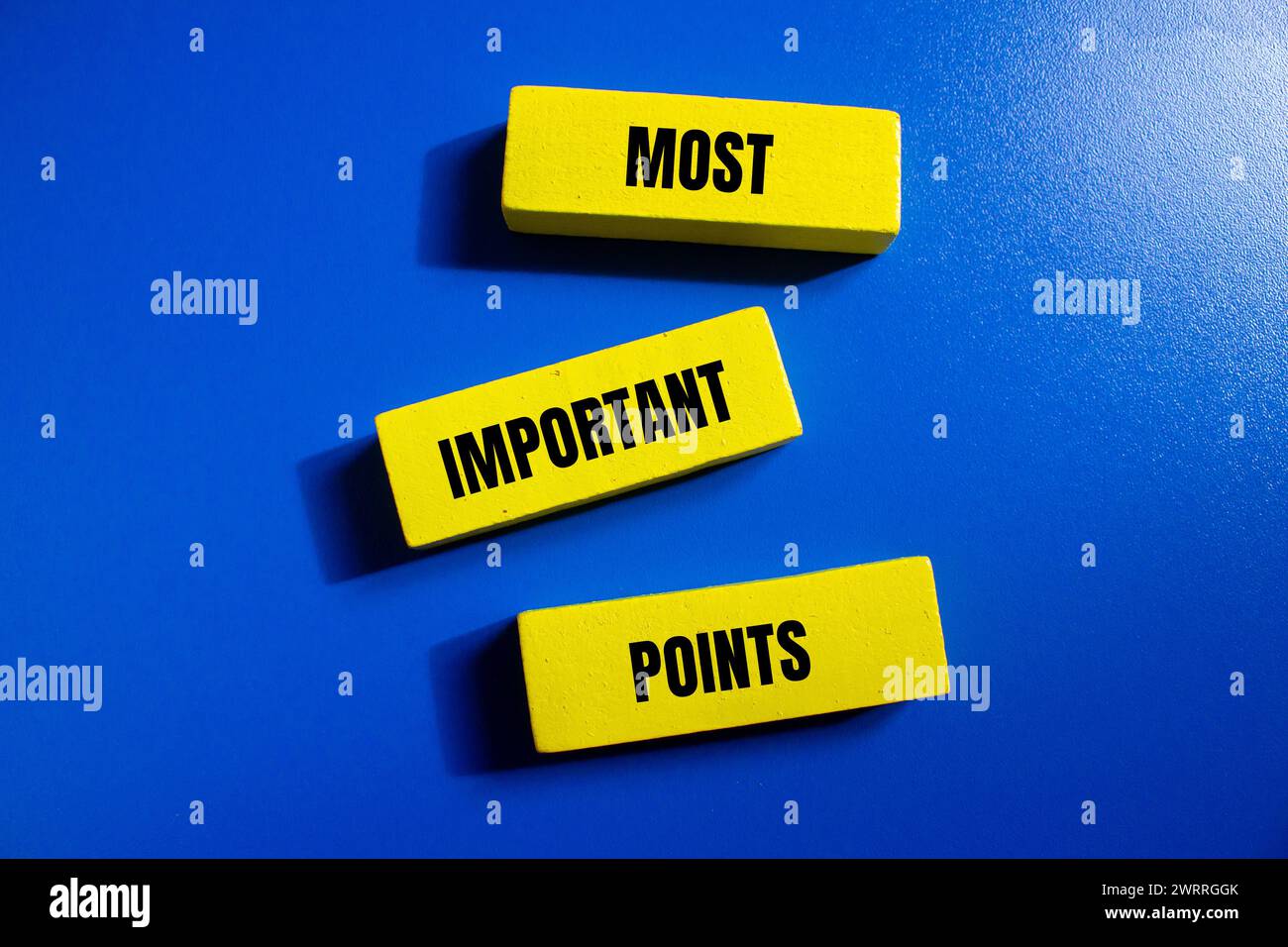 Most important points words written on wooden blocks with blue ...