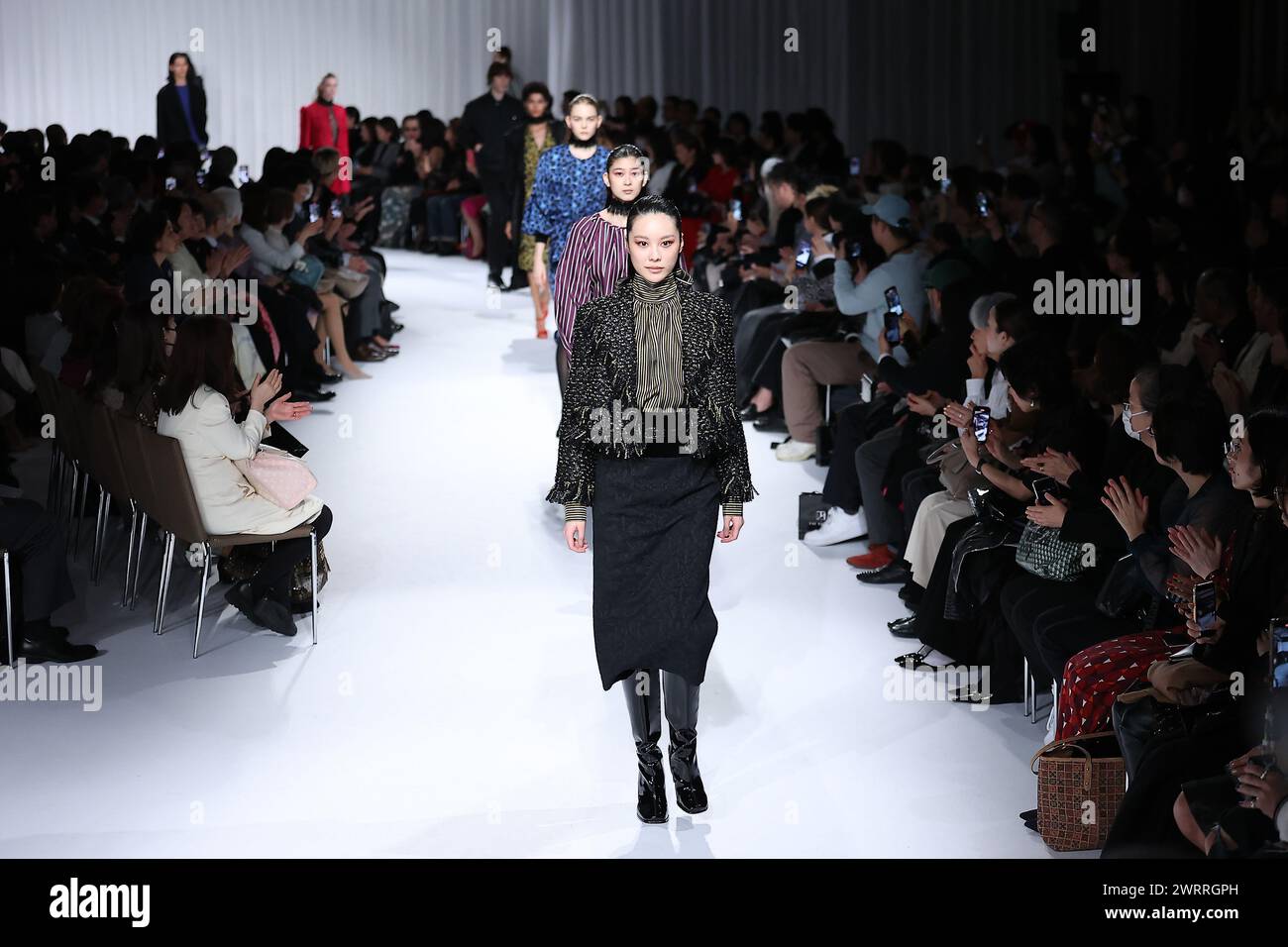 Tokyo, Japan. 14th Mar, 2024. Models walk down the TAE ASHIDA A/W Collection 2024-2025 runway ...