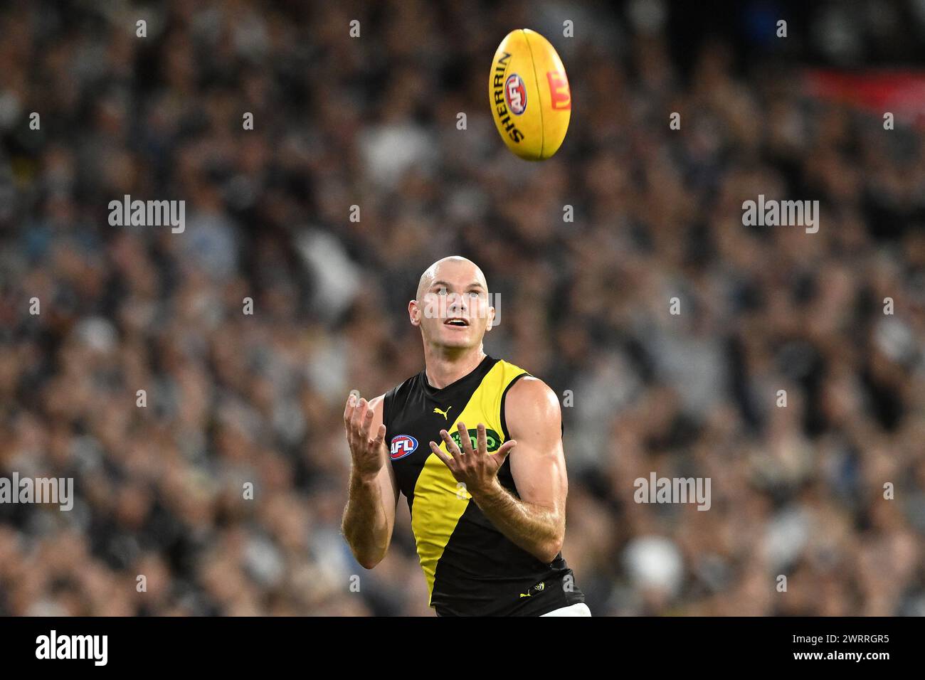Melbourne, Australia. 14th Mar, 2024. Kamdyn McIntosh of Richmond marks ...