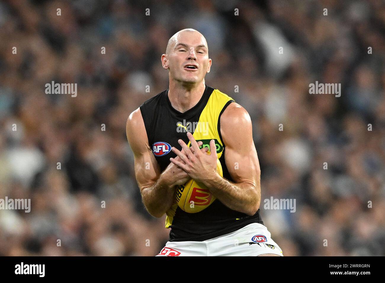 Melbourne, Australia. 14th Mar, 2024. Kamdyn McIntosh of Richmond marks ...