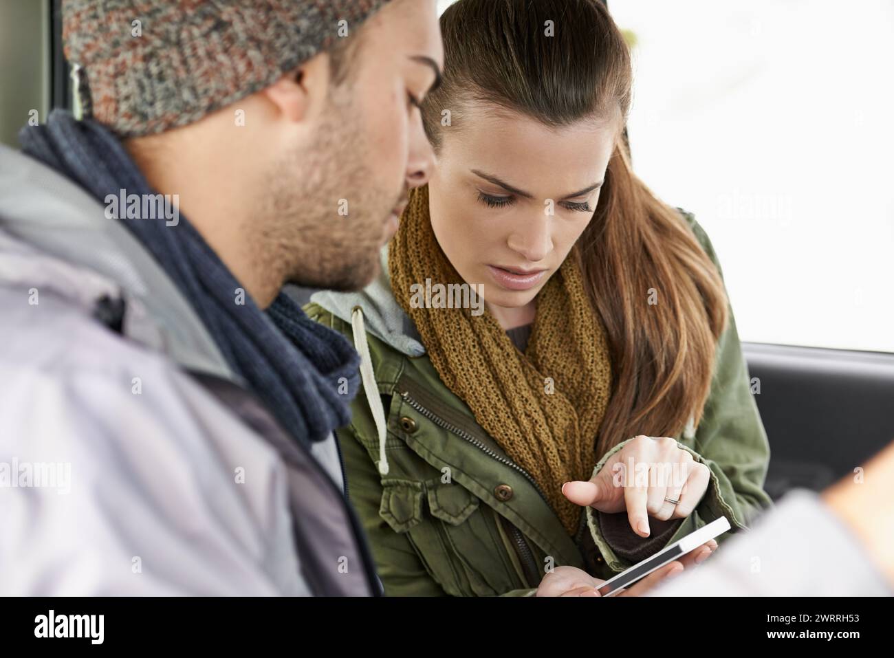 Road trip, couple and cellphone for navigation in car, game route and ...