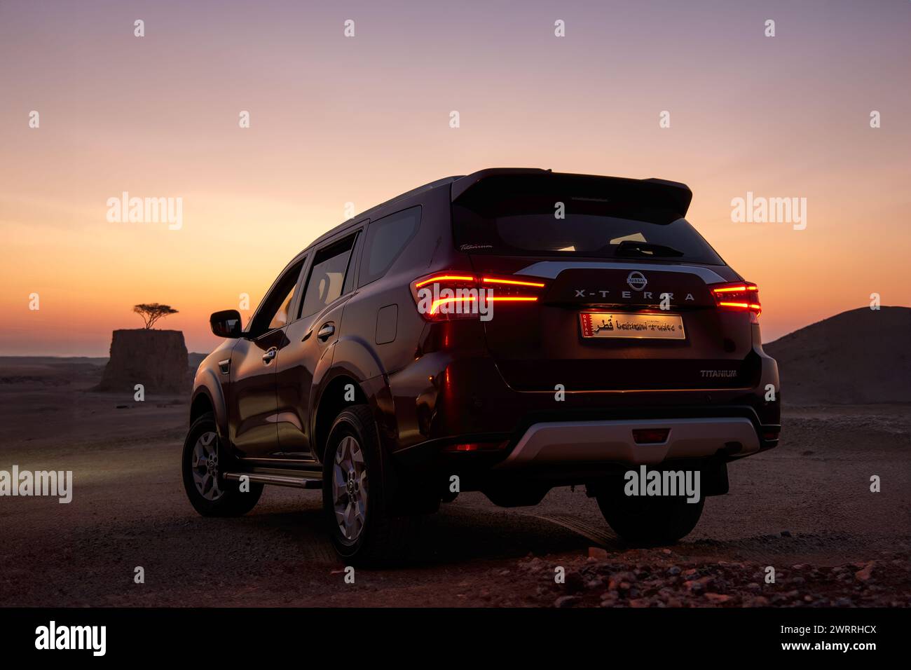 Nissan X terra SUV in Desert sunset sunrise Stock Photo - Alamy