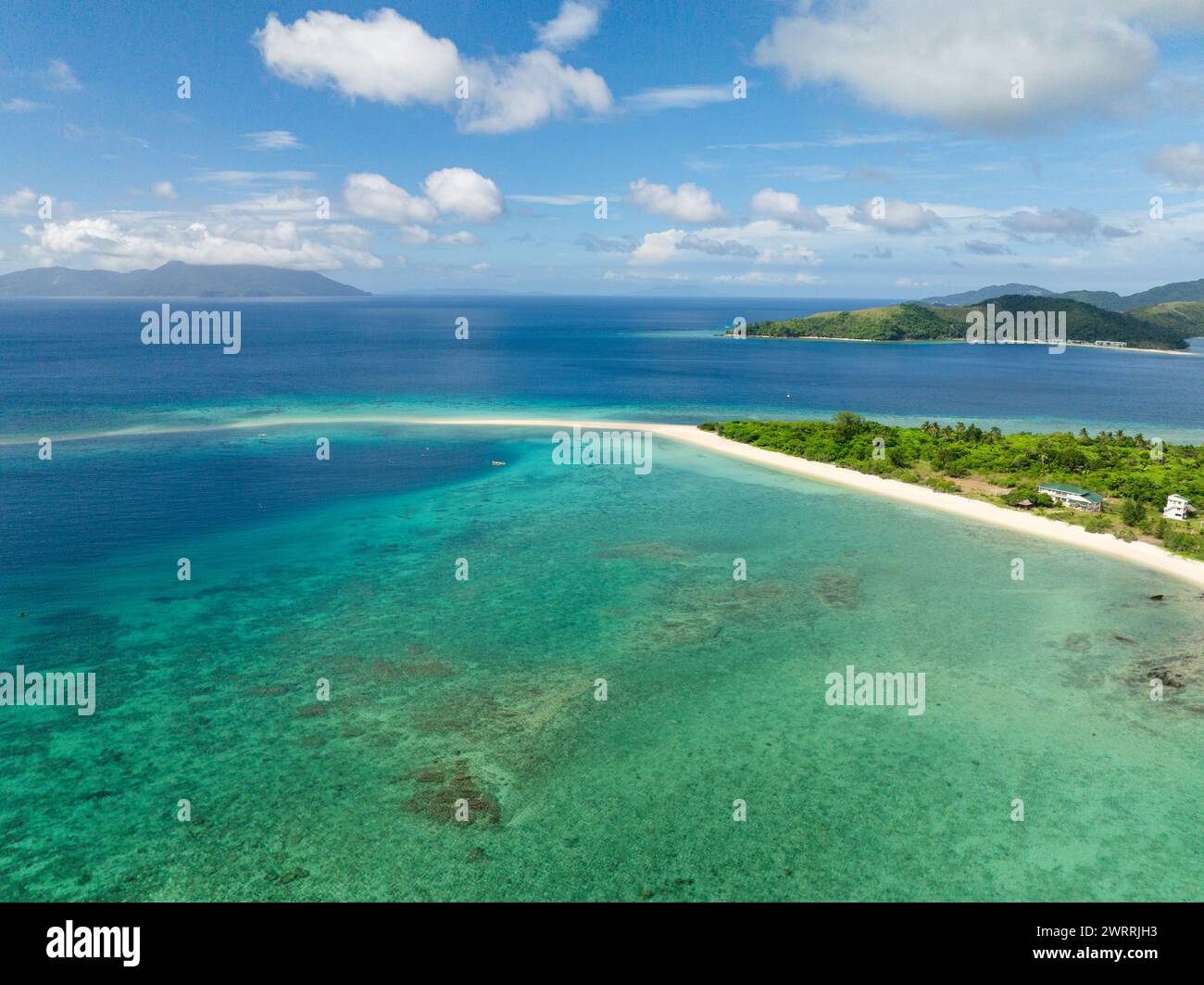 Clear turquoise water in white sand beach in Bon Bon Beach. Romblon ...