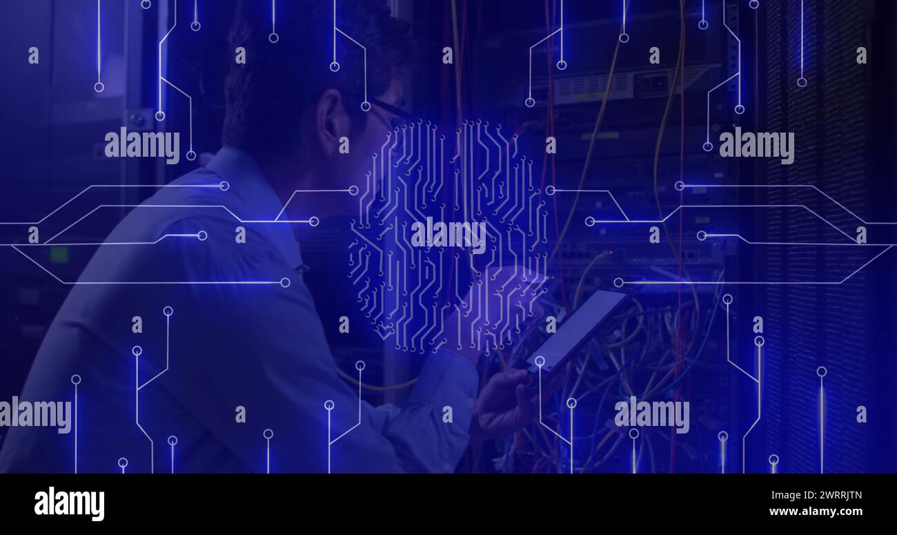 Image of computer circuit board and digital brain over asian man in ...