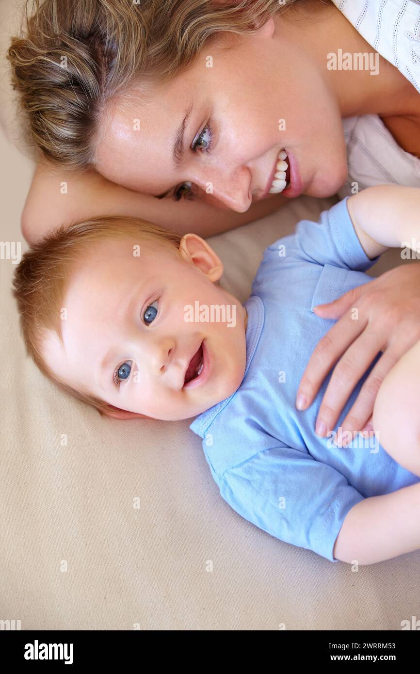 Baby, bonding and happy with mother, relaxing and love together with ...