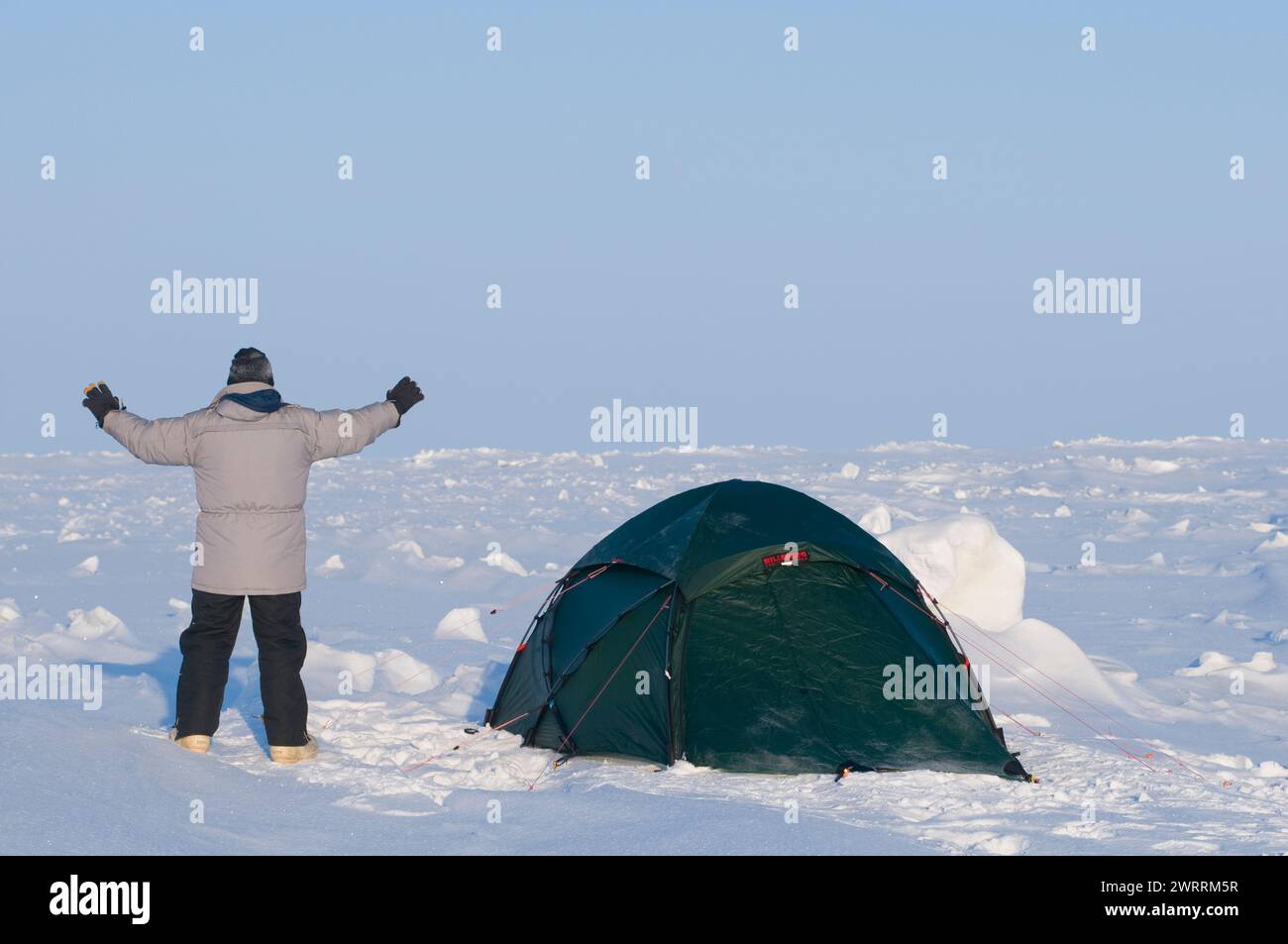 Photographer with camera and Hilleberg tent camped along the arctic ...